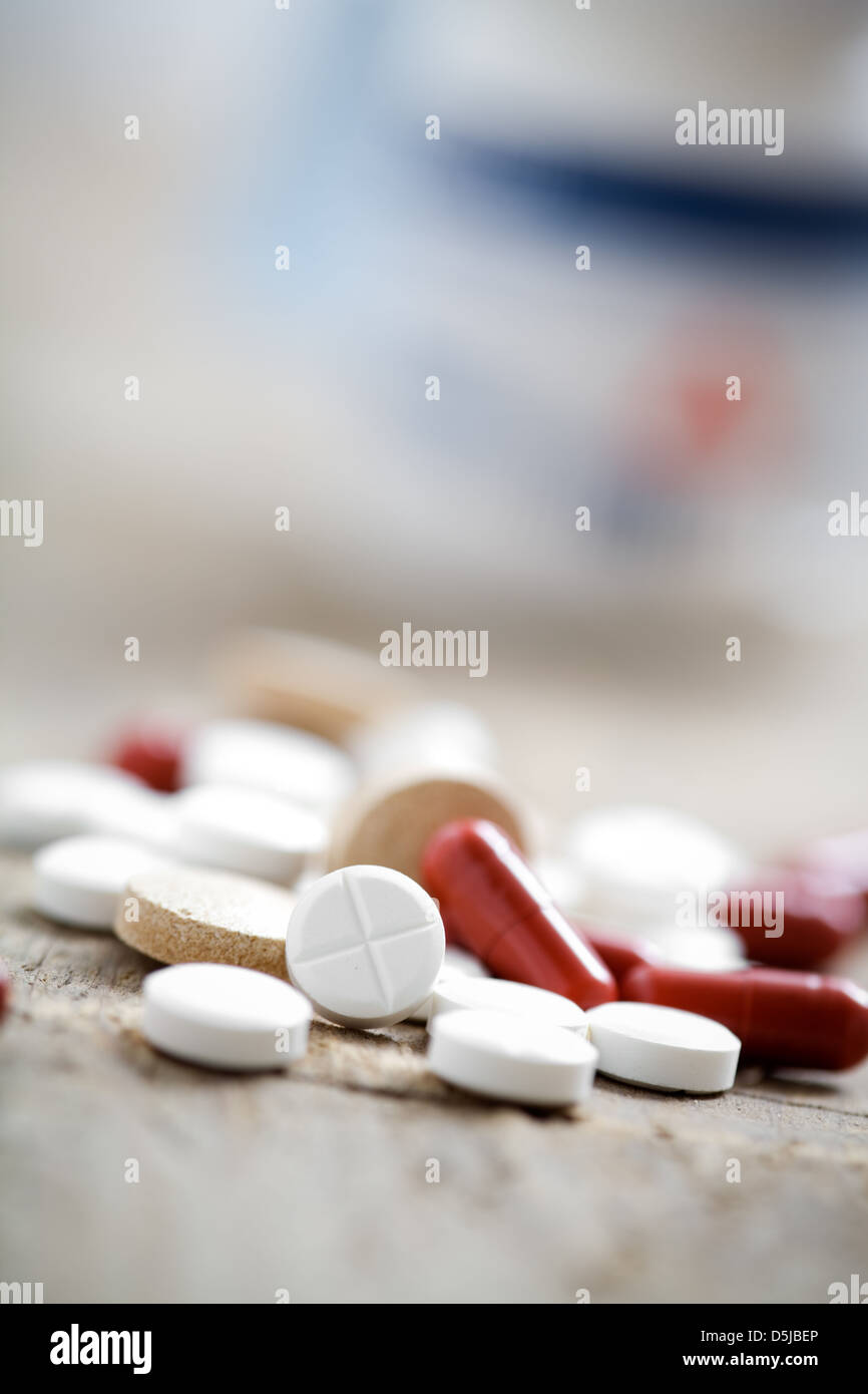 Collection of medicine pills on table, selective focus Stock Photo - Alamy
