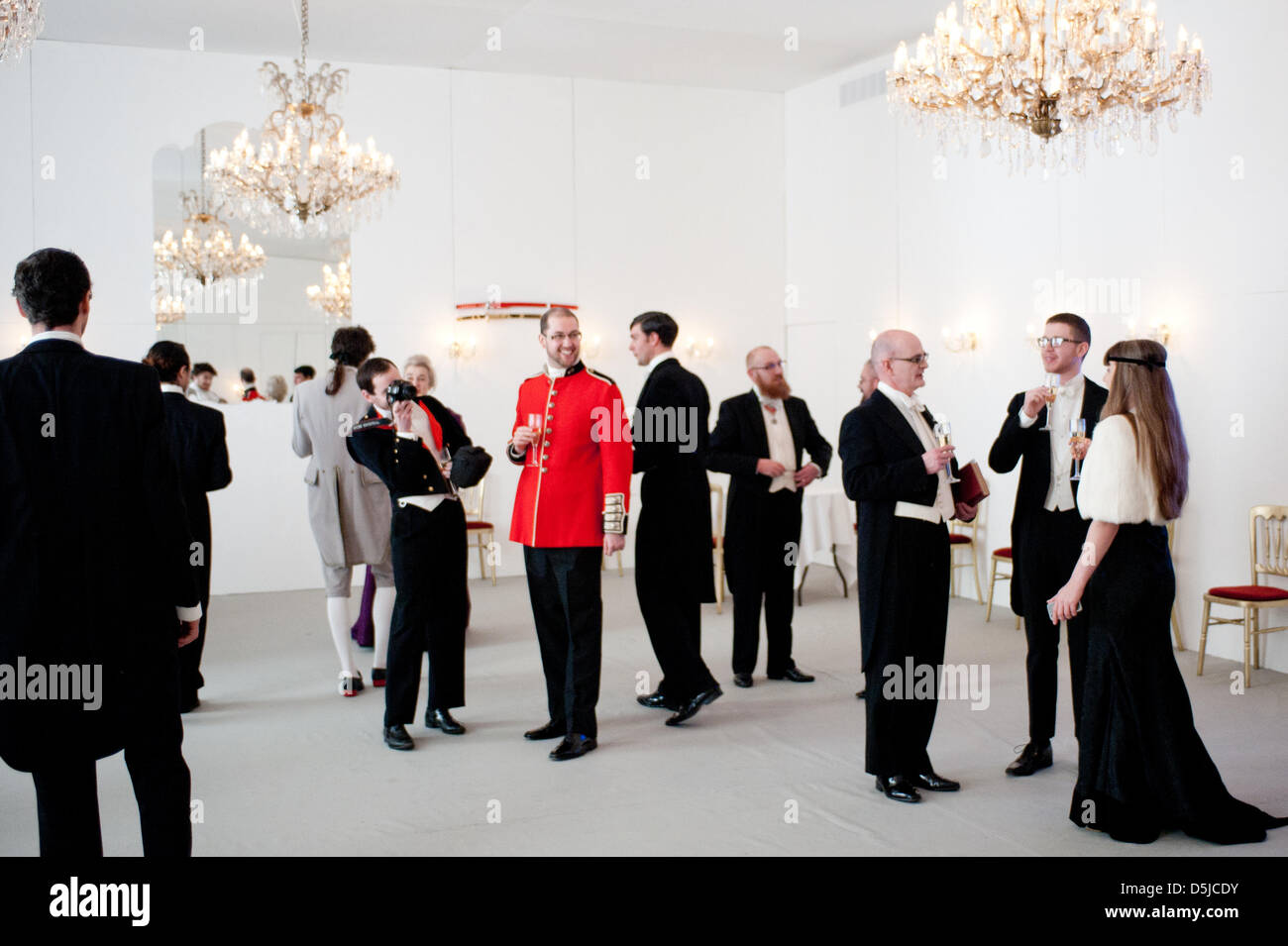 London, UK. 3rd April 2013. Guests mingle together in full period ...