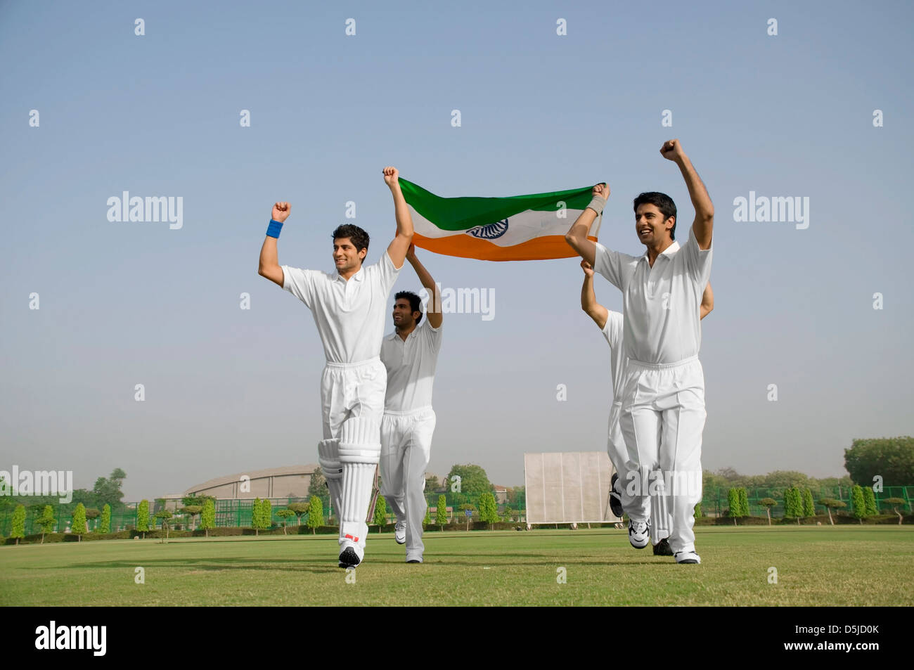 Indian cricketers with flag hi-res stock photography and images - Alamy