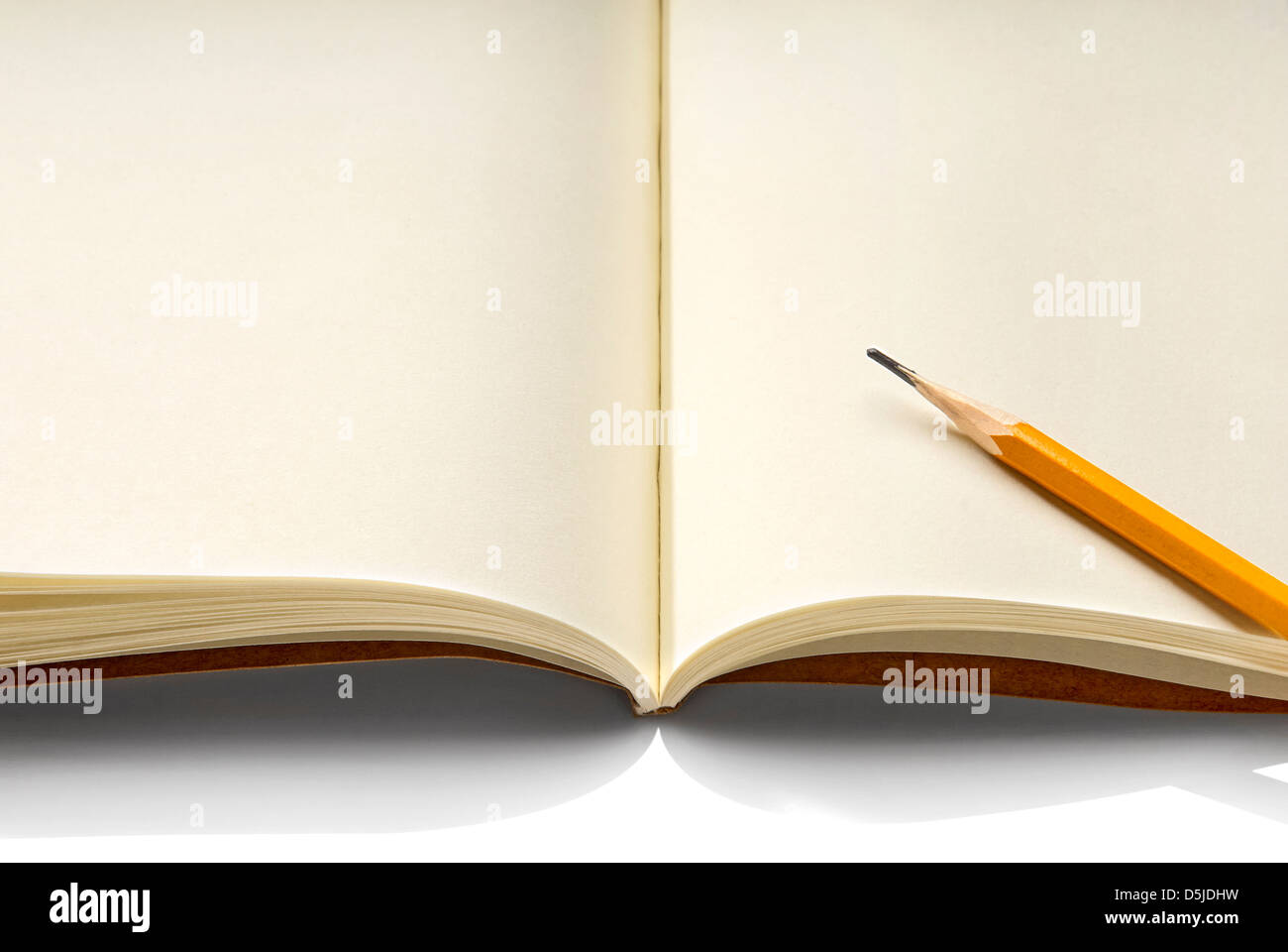 Notebook and pencil isolated on white background. Copy Space to write ...