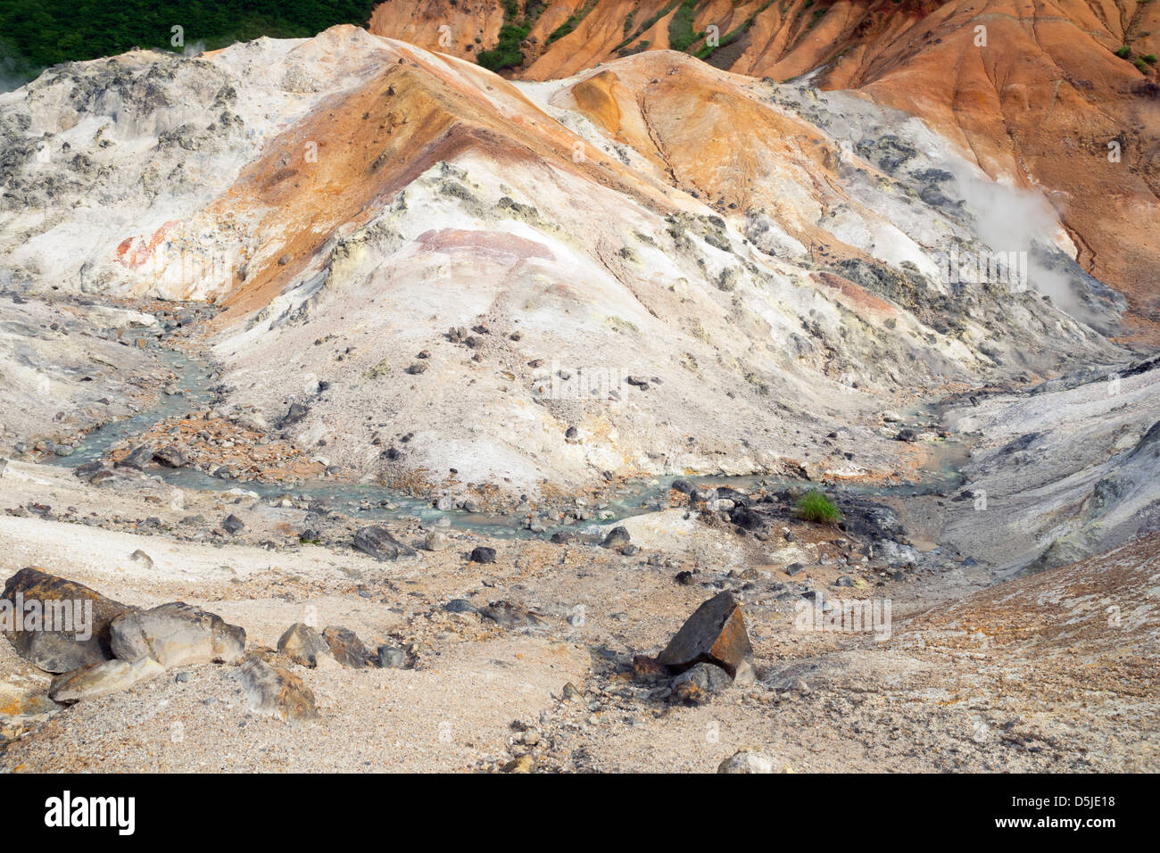 colorful volcanic land with hot spring between hills Stock Photo - Alamy