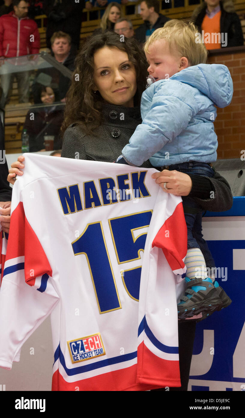 Widow of hockey player Jan Marek Lucie Markova is seen with their son ...