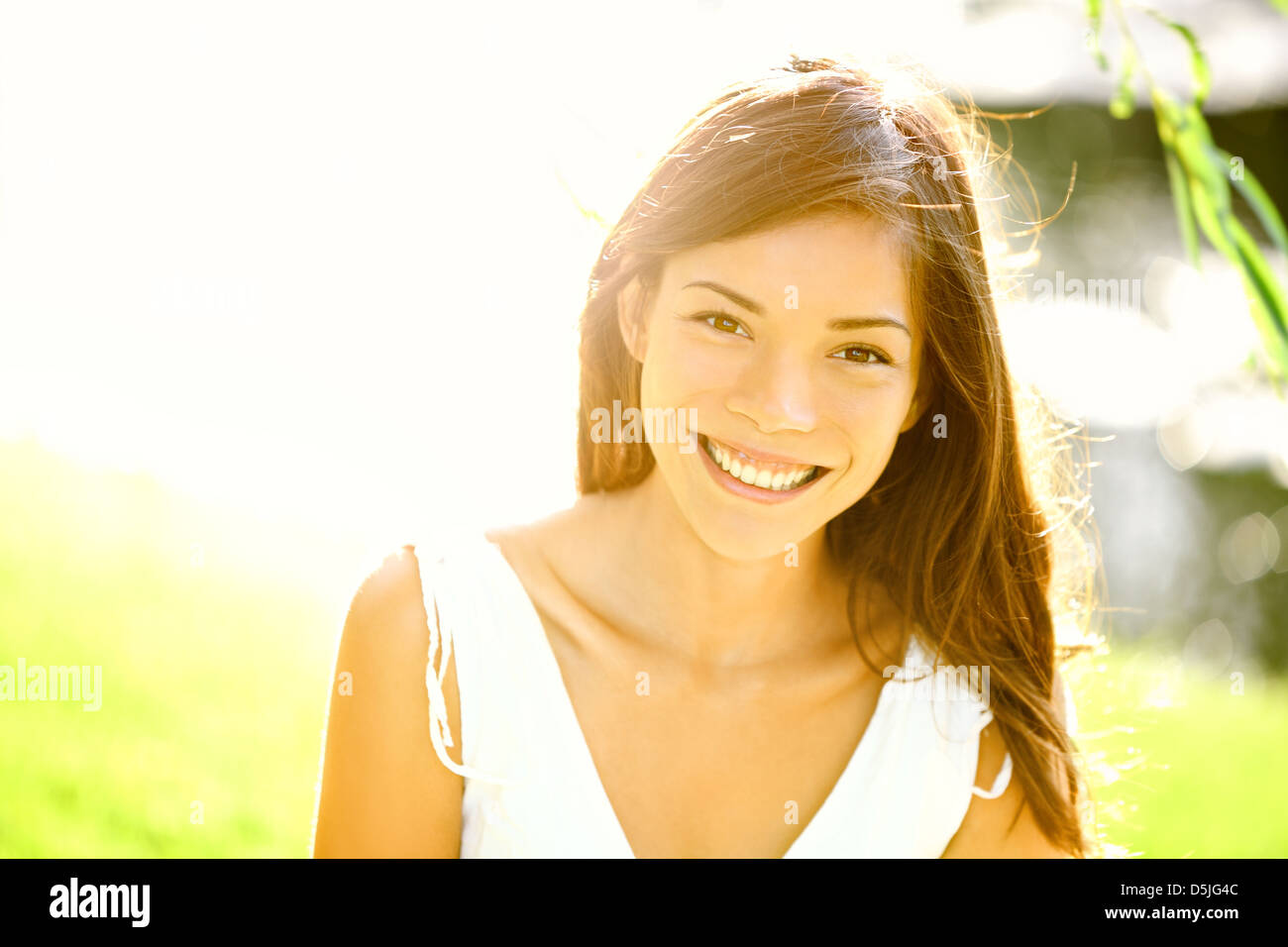 Portrait of pretty mixed race Caucasian / Chinese Asian young woman on ...
