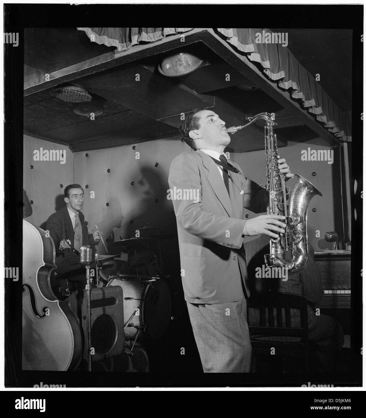 Jazz musicians Charlie Ventura and Dave Tough are captured at the Three ...