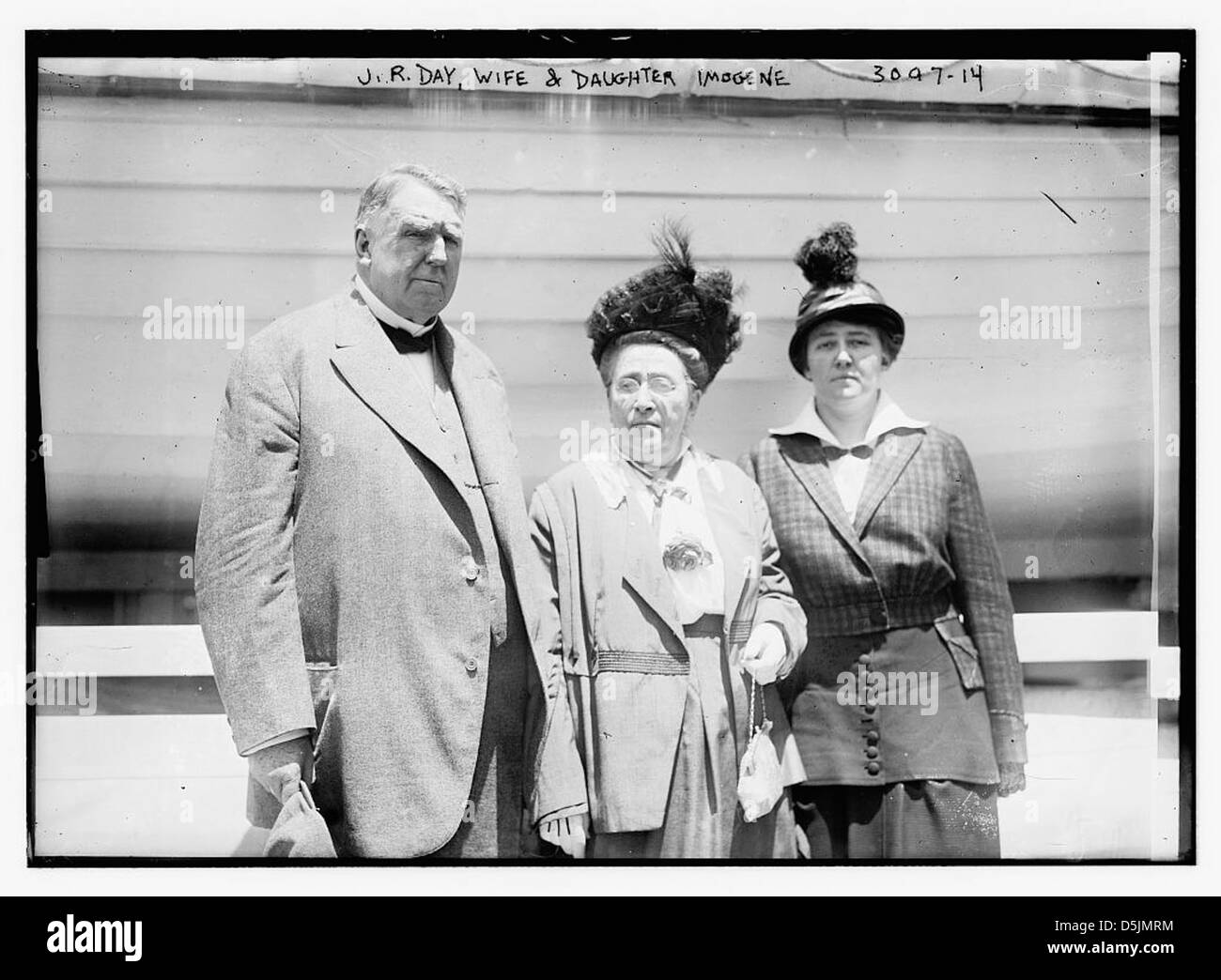 A photograph of J.R. Day with his wife and daughter, Imogene, standing ...