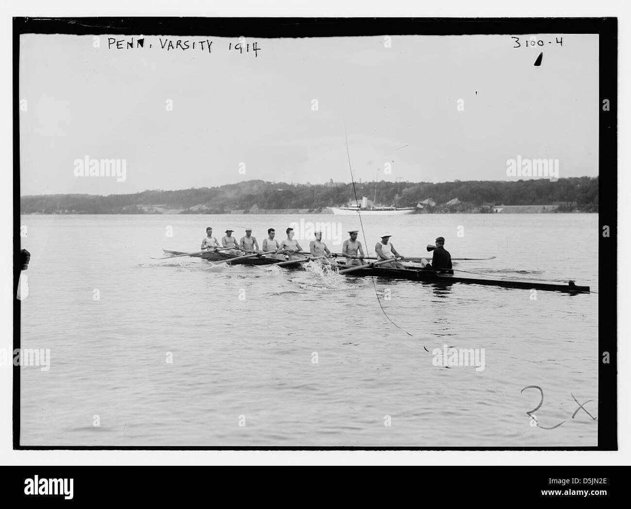 The Penn. Varsity rowing team is shown in a historic photograph taken ...