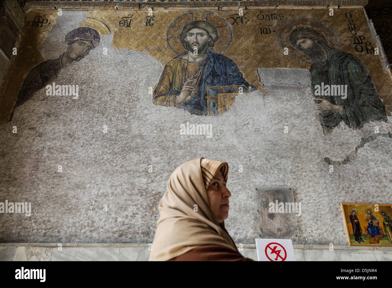 Islamic woman in front of The Deesis mosaic with Christ as ruler Stock ...