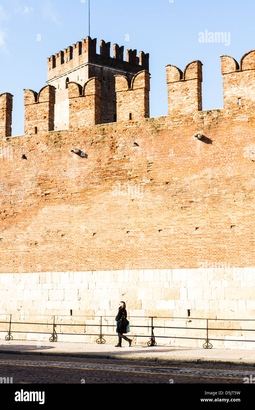 Woman walking in front of castle hi-res stock photography and images ...