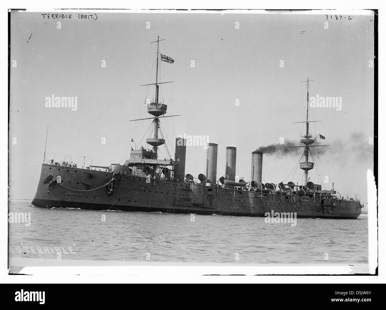 The photograph shows the British armored cruiser 'Terrible' (1895), a ...