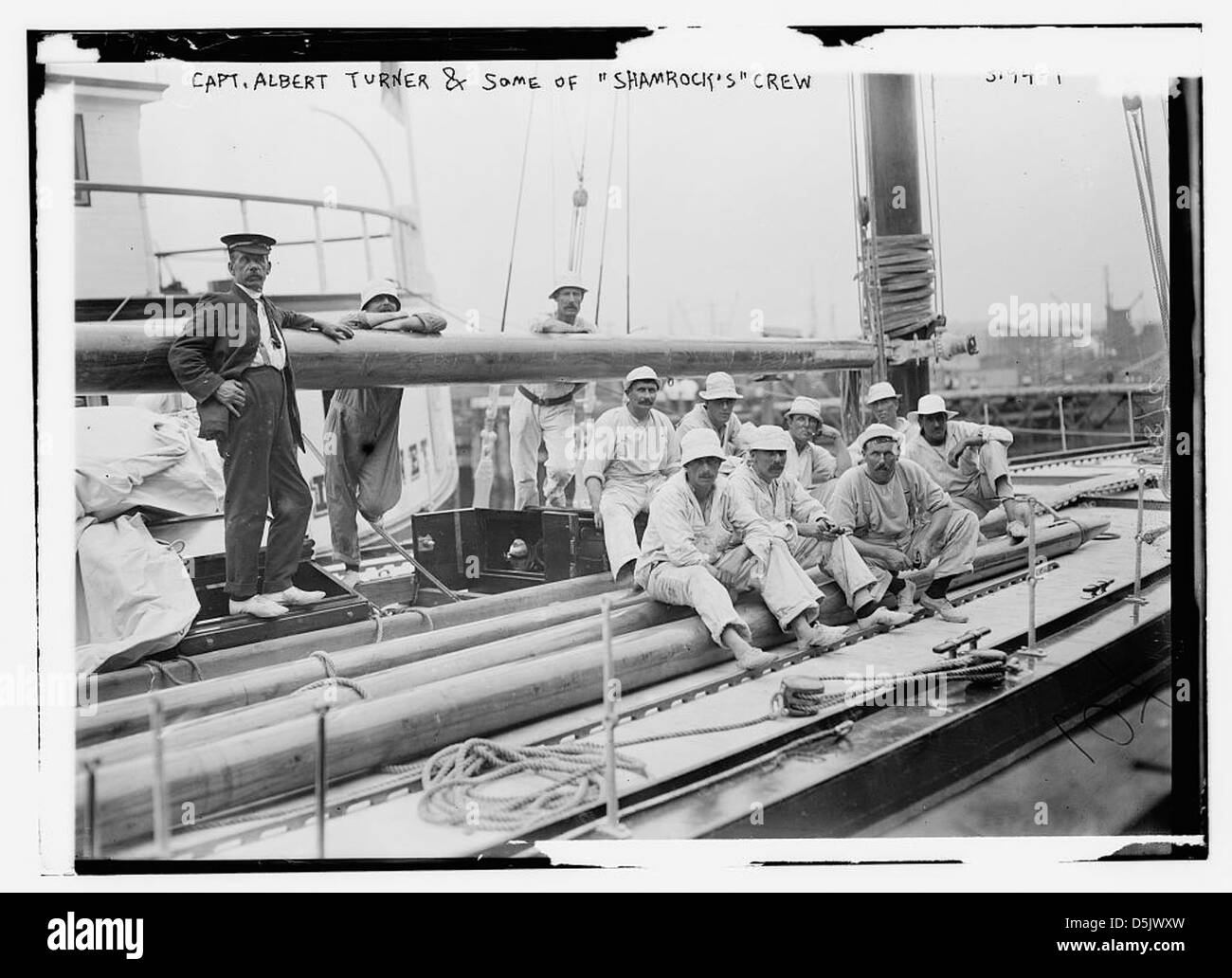 A historical photo showing Captain Albert Turner with members of the ...