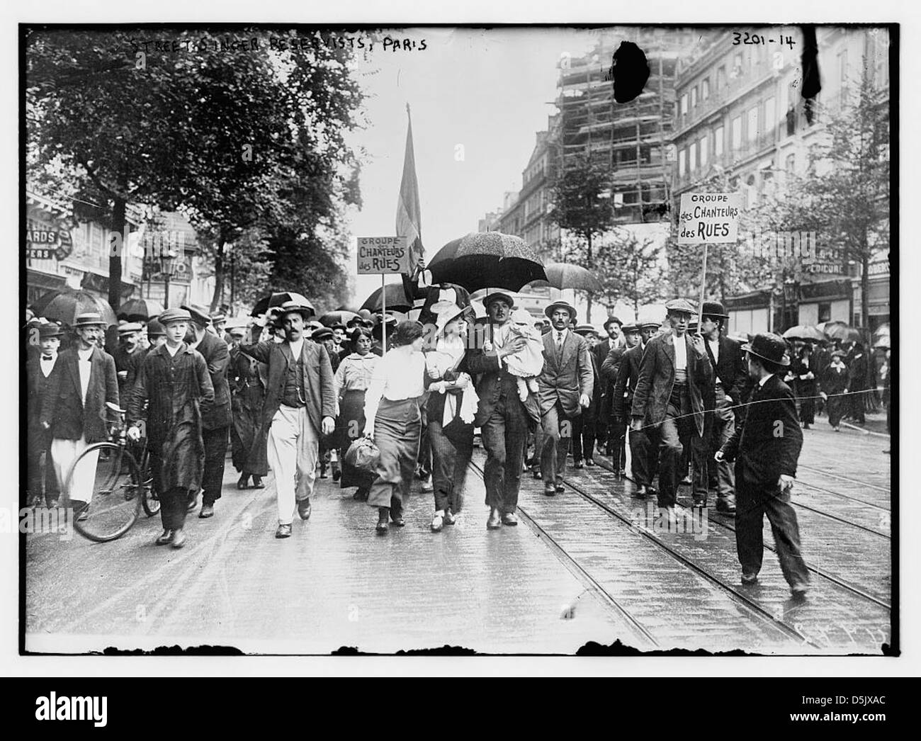 A street singer and reservists in Paris, captured by the Library of ...