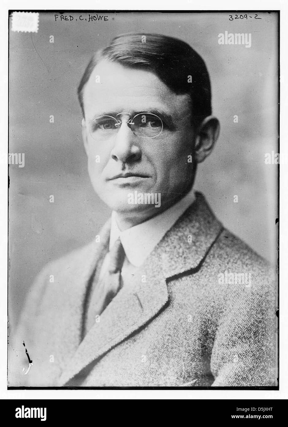 This image shows Fred C. Howe, a historical figure captured in a formal ...