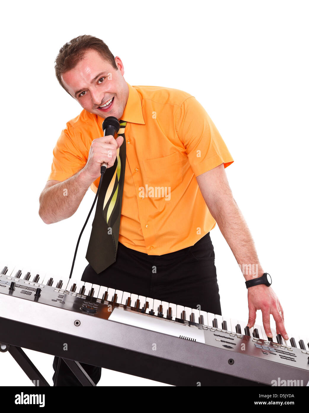 Man in orange shirt singing and playing keyboard - white background ...