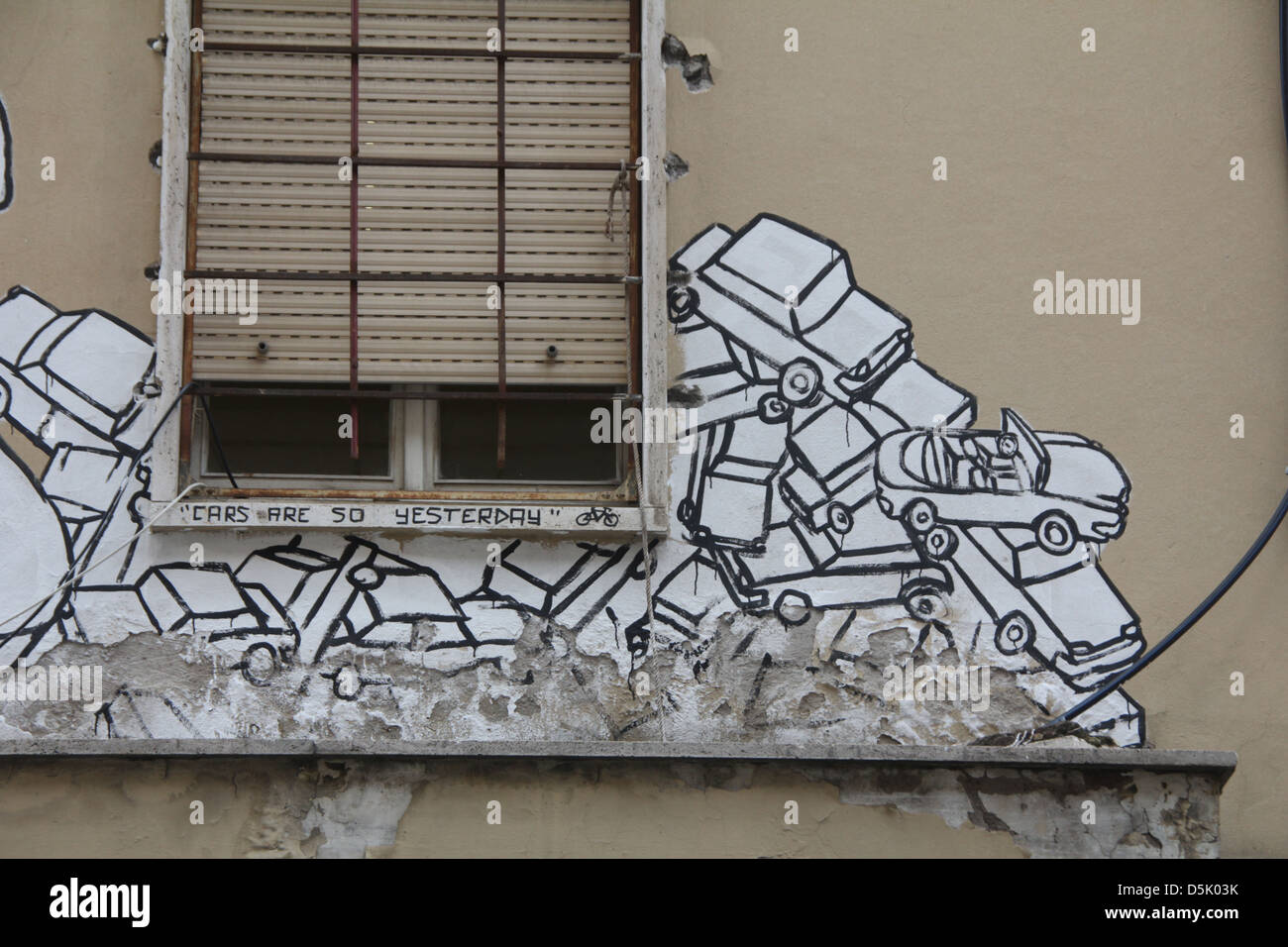 anti cars graffiti on wall in rome italy Stock Photo - Alamy