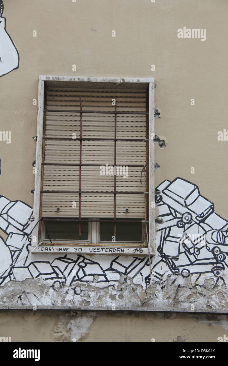 anti cars graffiti on wall in rome italy Stock Photo - Alamy