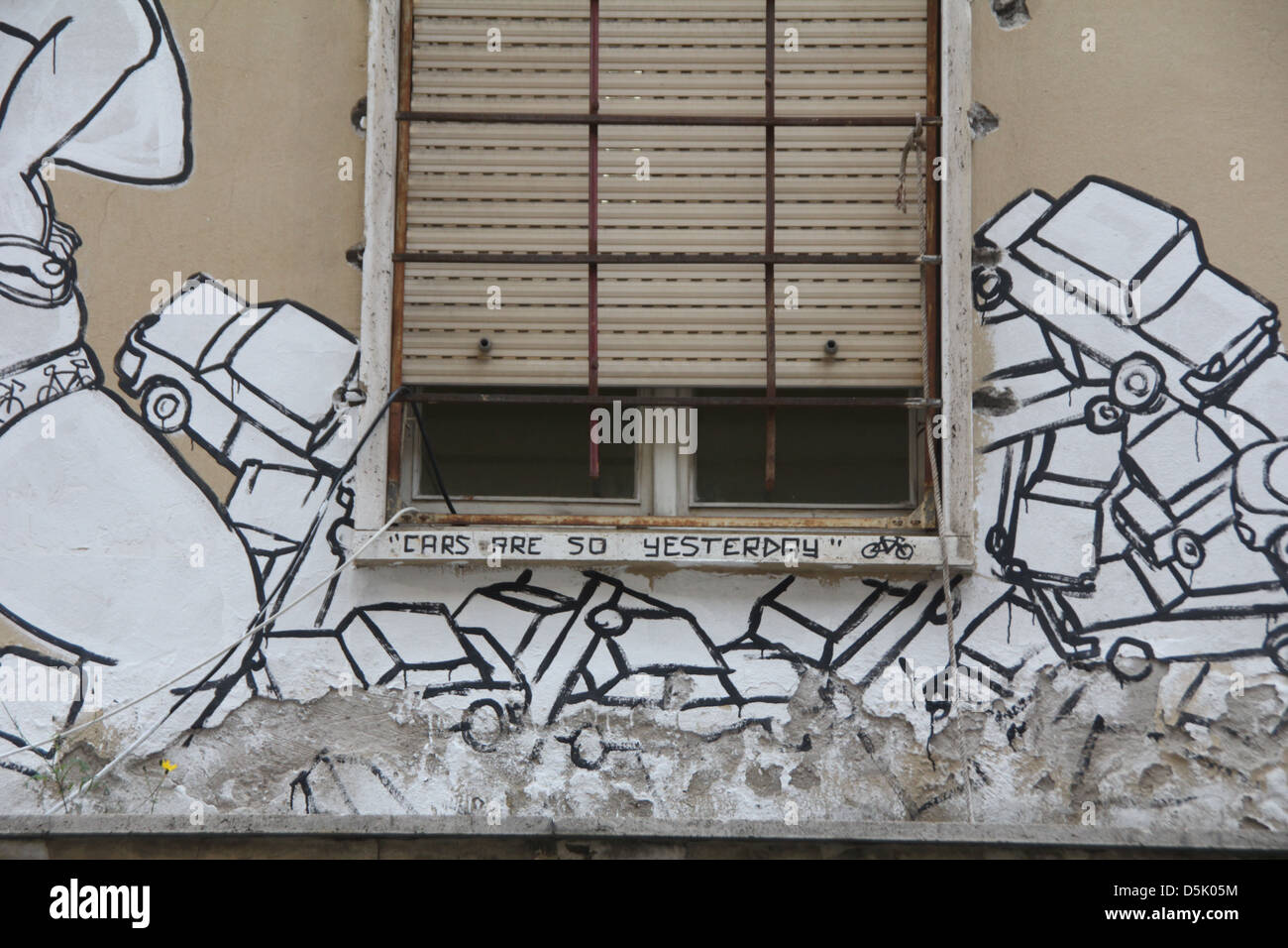 anti cars graffiti on wall in rome italy Stock Photo - Alamy