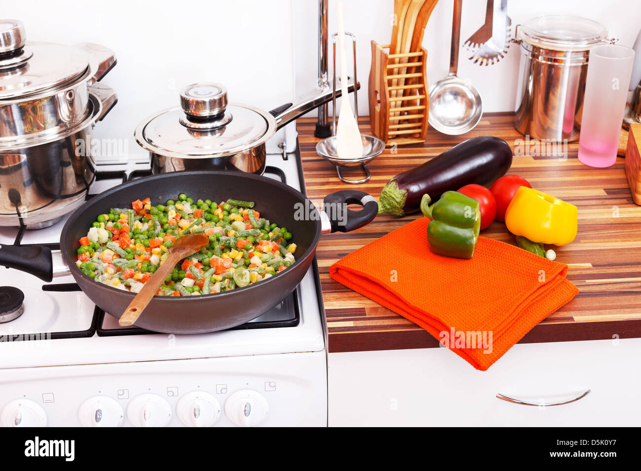 Frozen vegetables ready to cook in the kitchen Stock Photo - Alamy