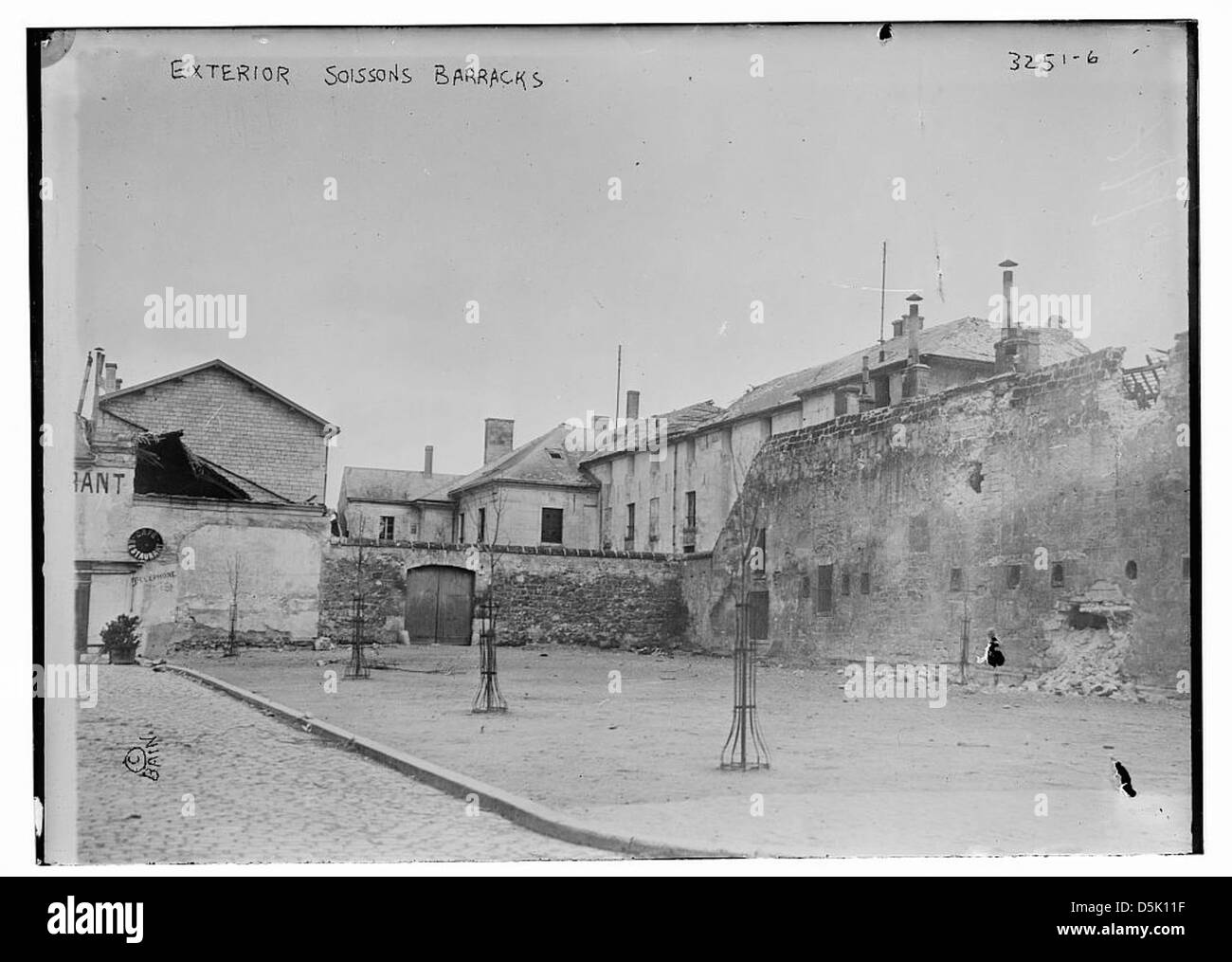 The exterior of the Soissons Barracks shows visible battle damage from ...