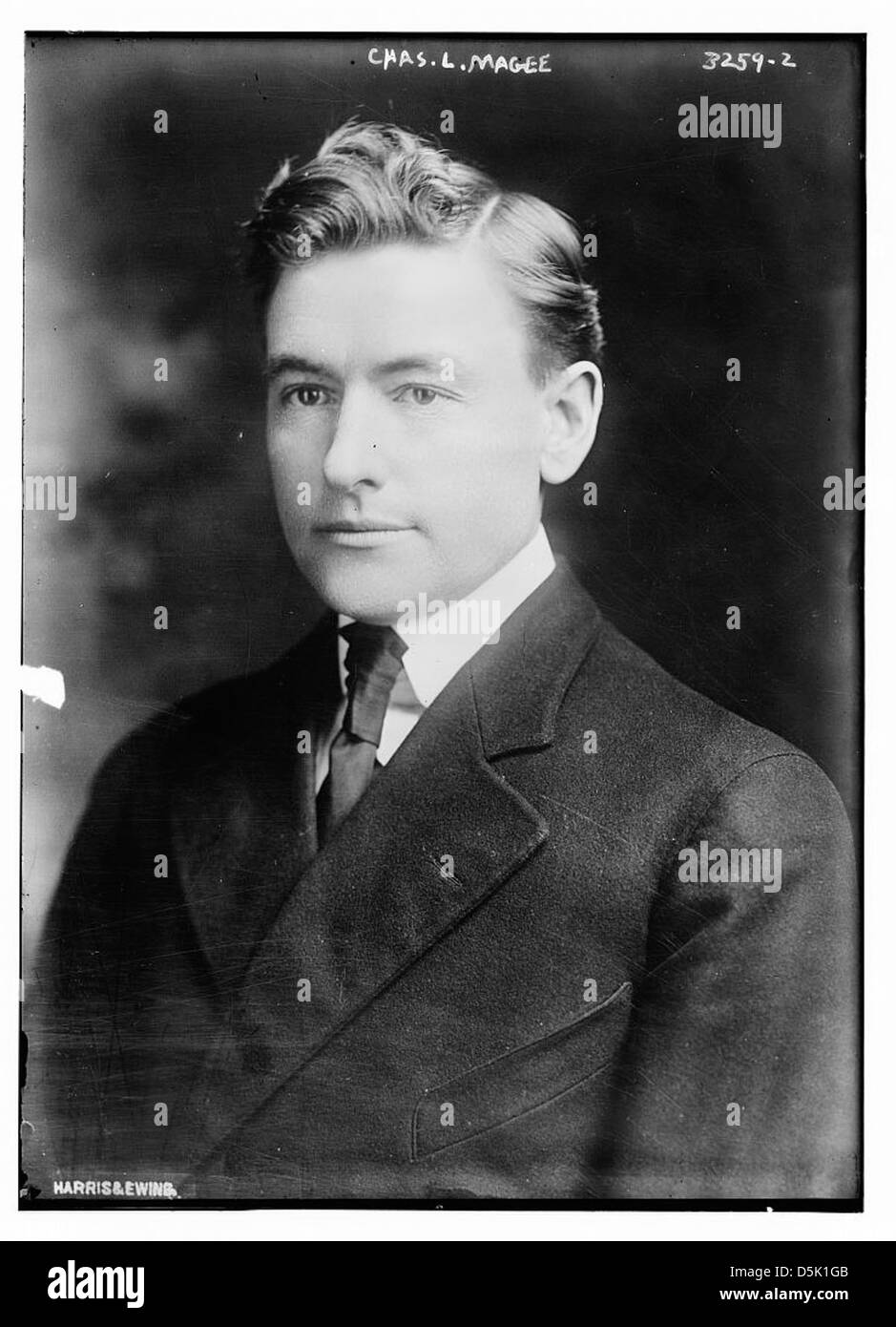 This photograph features Charles L. Magee, a key figure in the American ...