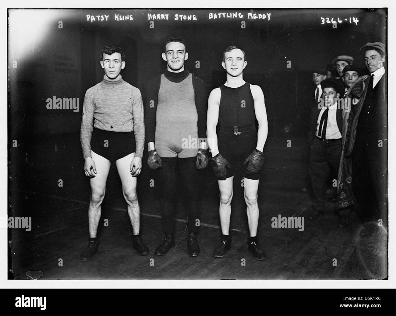 The image features boxers Patsy Kline, Harry Stone, and Battling Reddy ...
