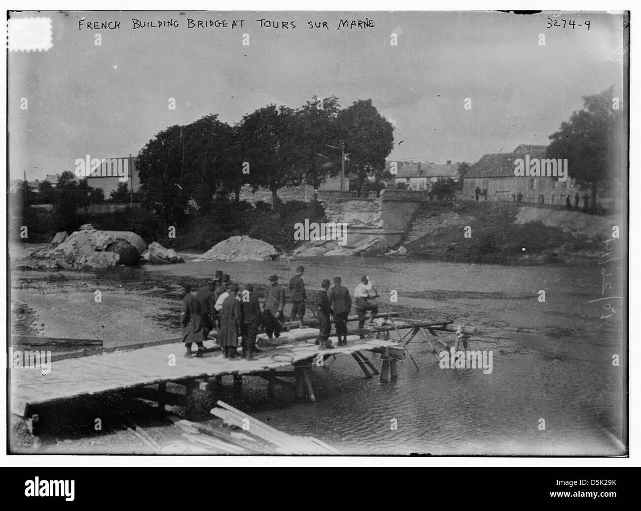 A photograph showing French combat engineers building a bridge at Tours ...