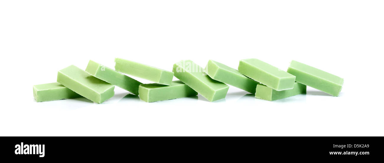 Green colorful candy bars on white background Stock Photo - Alamy