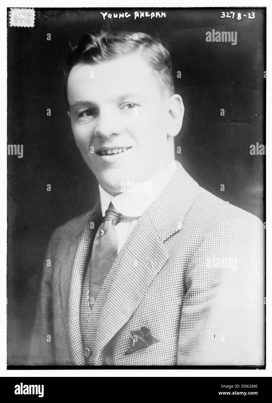 This photograph features a young Ahearn, possibly an individual with ...