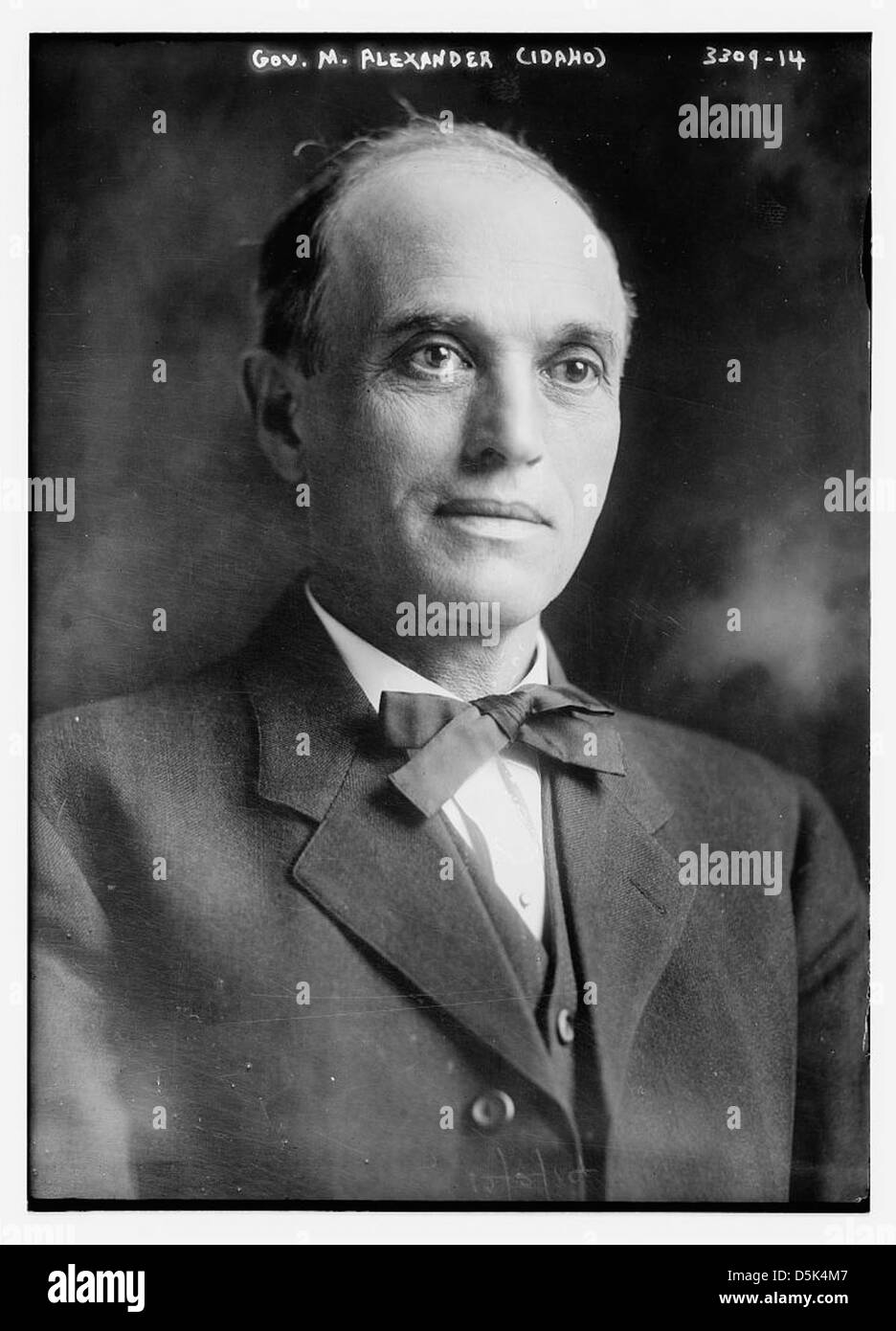 A formal portrait of Governor M. Alexander of Idaho, showing him in a ...