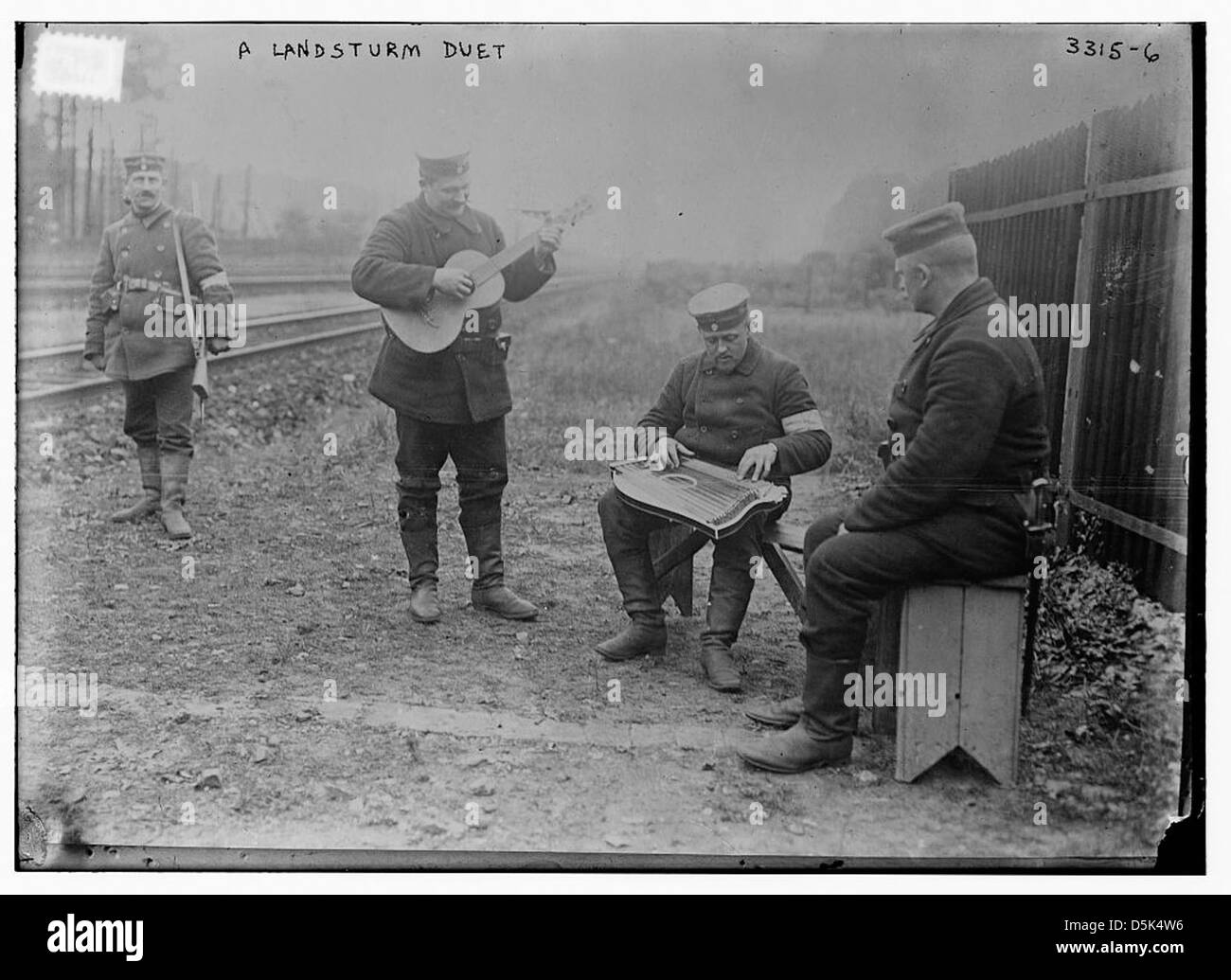 This photograph features two German soldiers from World War I ...