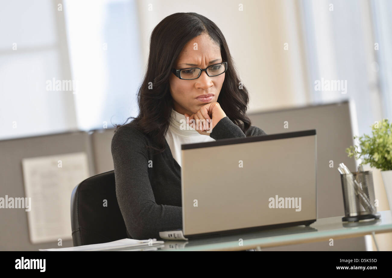 Female office worker Stock Photo - Alamy