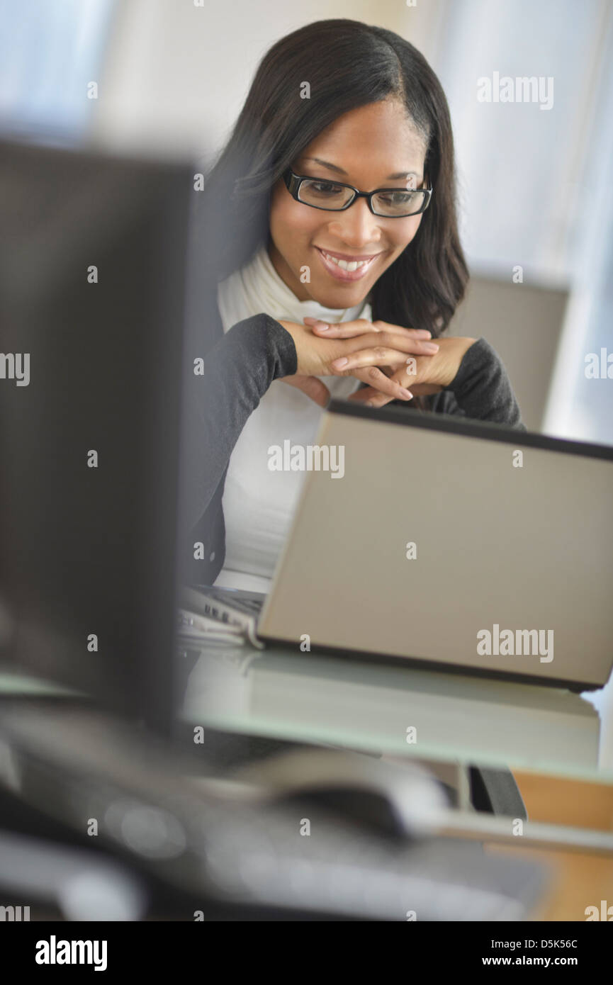 Female office worker Stock Photo - Alamy