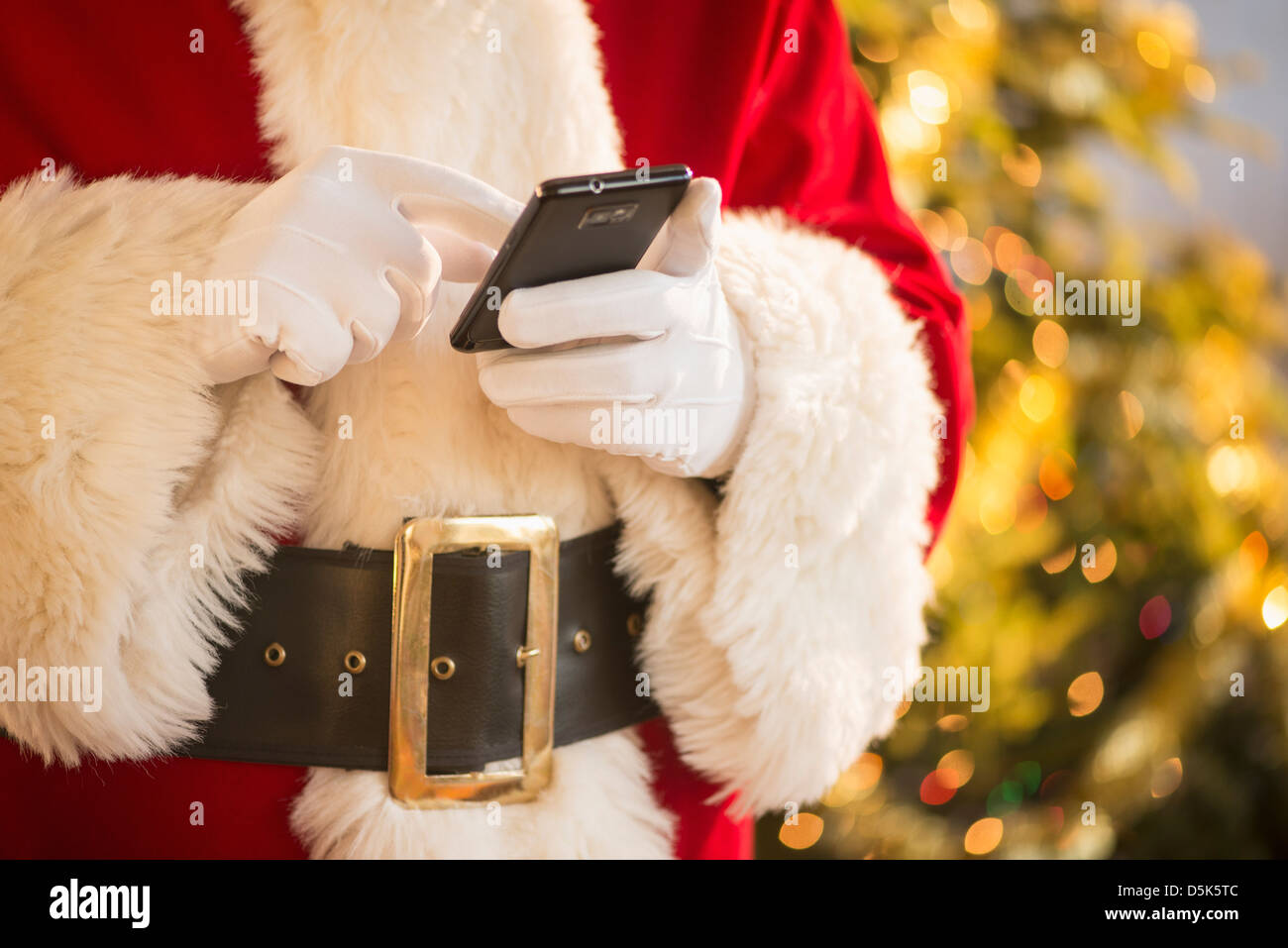Santa claus using mobile phone hi-res stock photography and images - Alamy