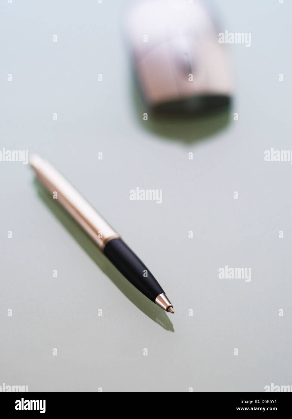 Pen and computer mouse Stock Photo - Alamy