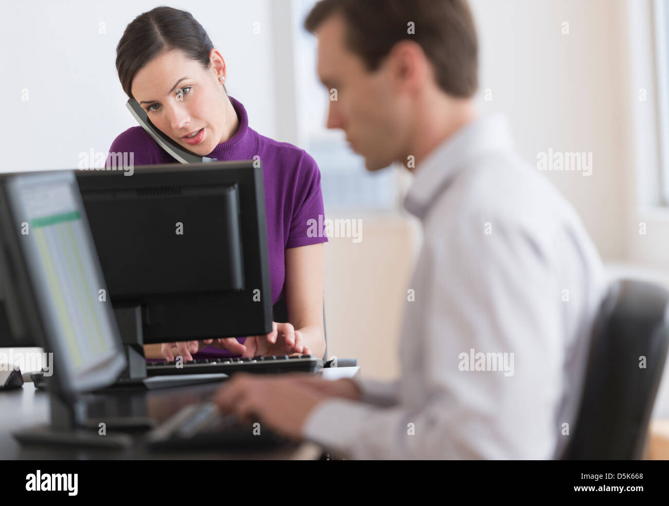 Office workers using computers Stock Photo - Alamy Office workers using computers Stock Photo - Alamy