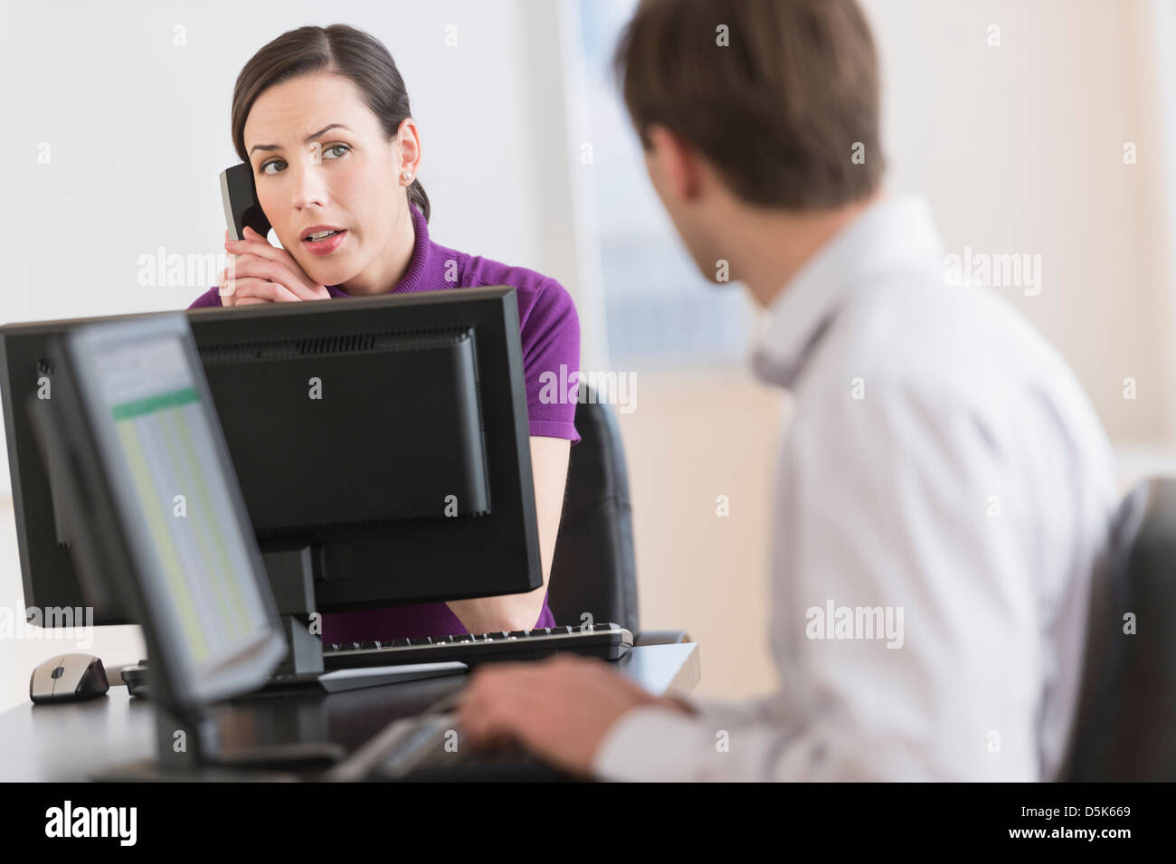 Office workers using computers Stock Photo - Alamy Office workers using computers Stock Photo - Alamy