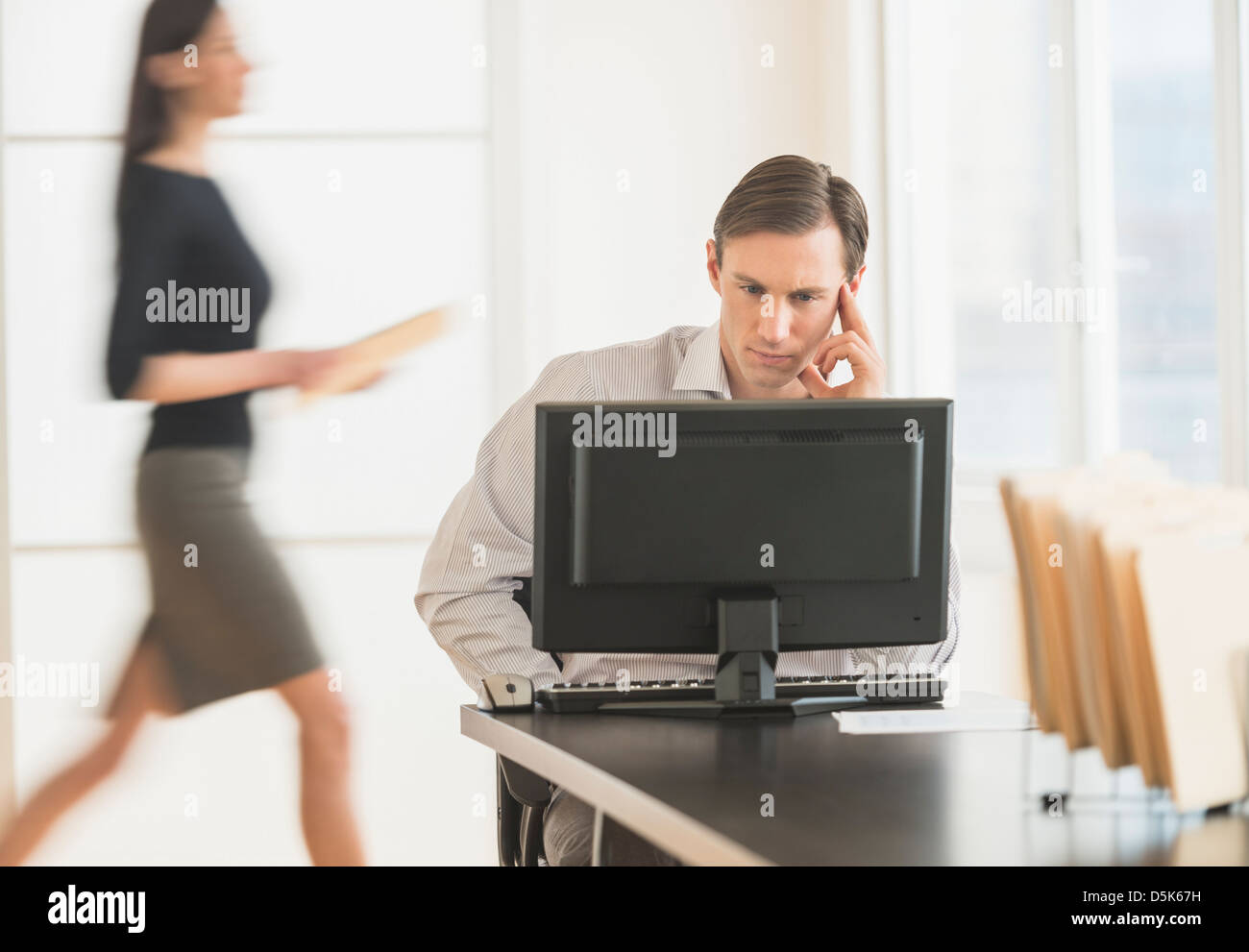 Very busy office worker hi-res stock photography and images - Alamy