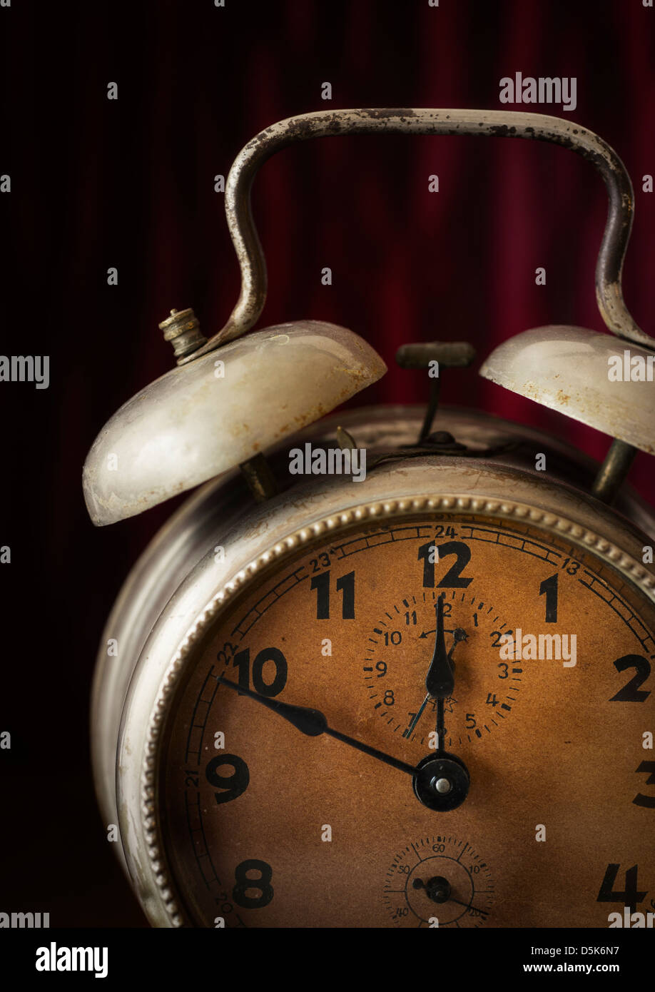 Still life with antique alarm clock Stock Photo - Alamy