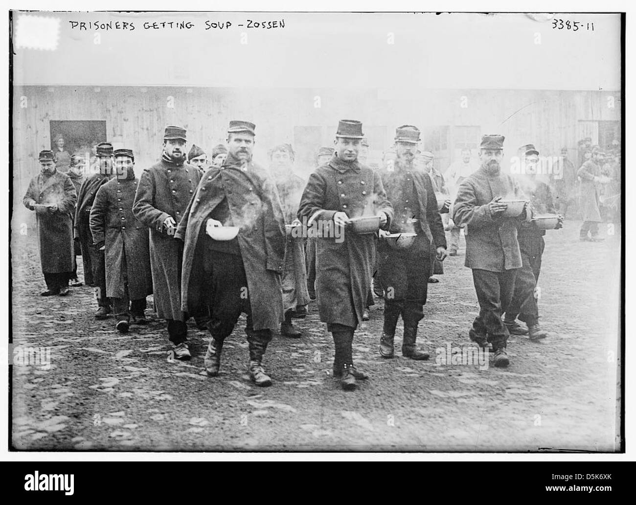 This photograph depicts prisoners of war at Zossen Camp in Germany ...