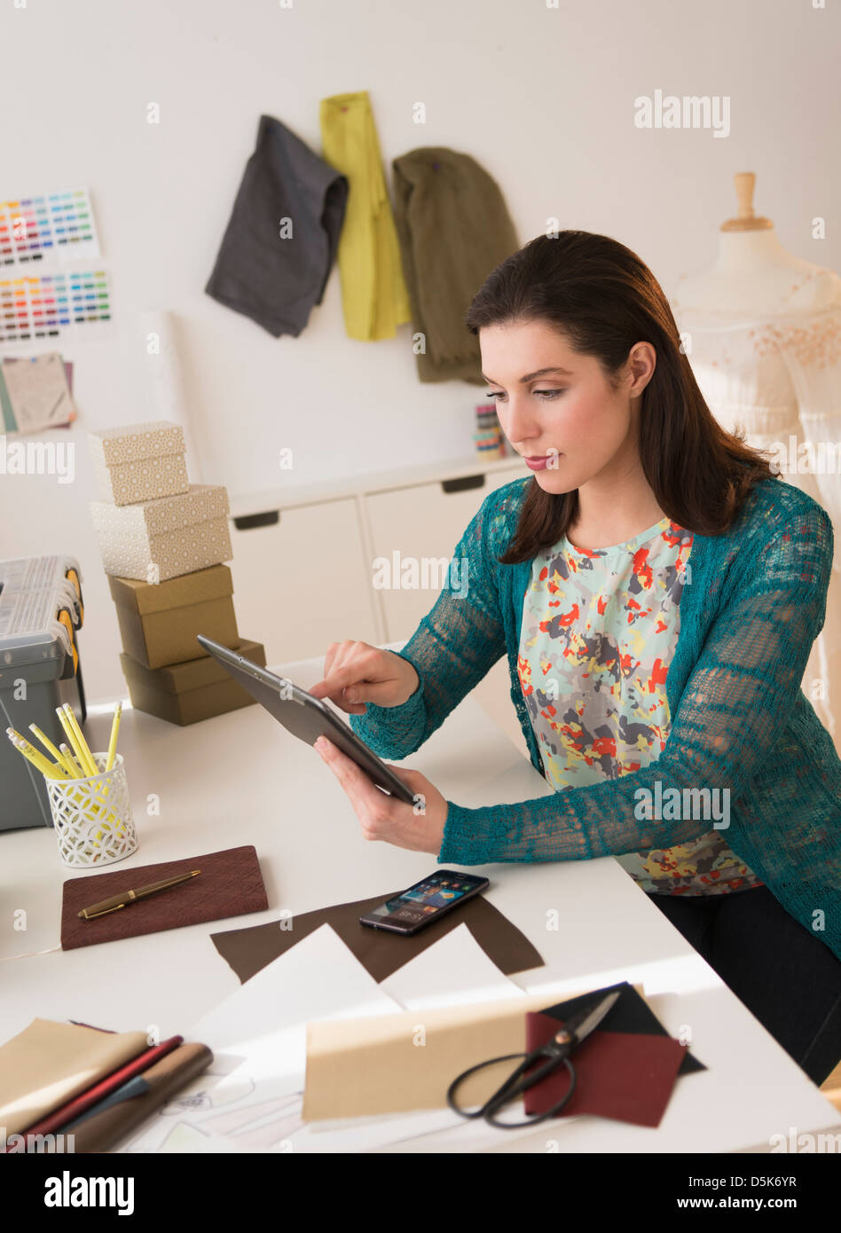 Female designer using digital tablet hi-res stock photography and ...