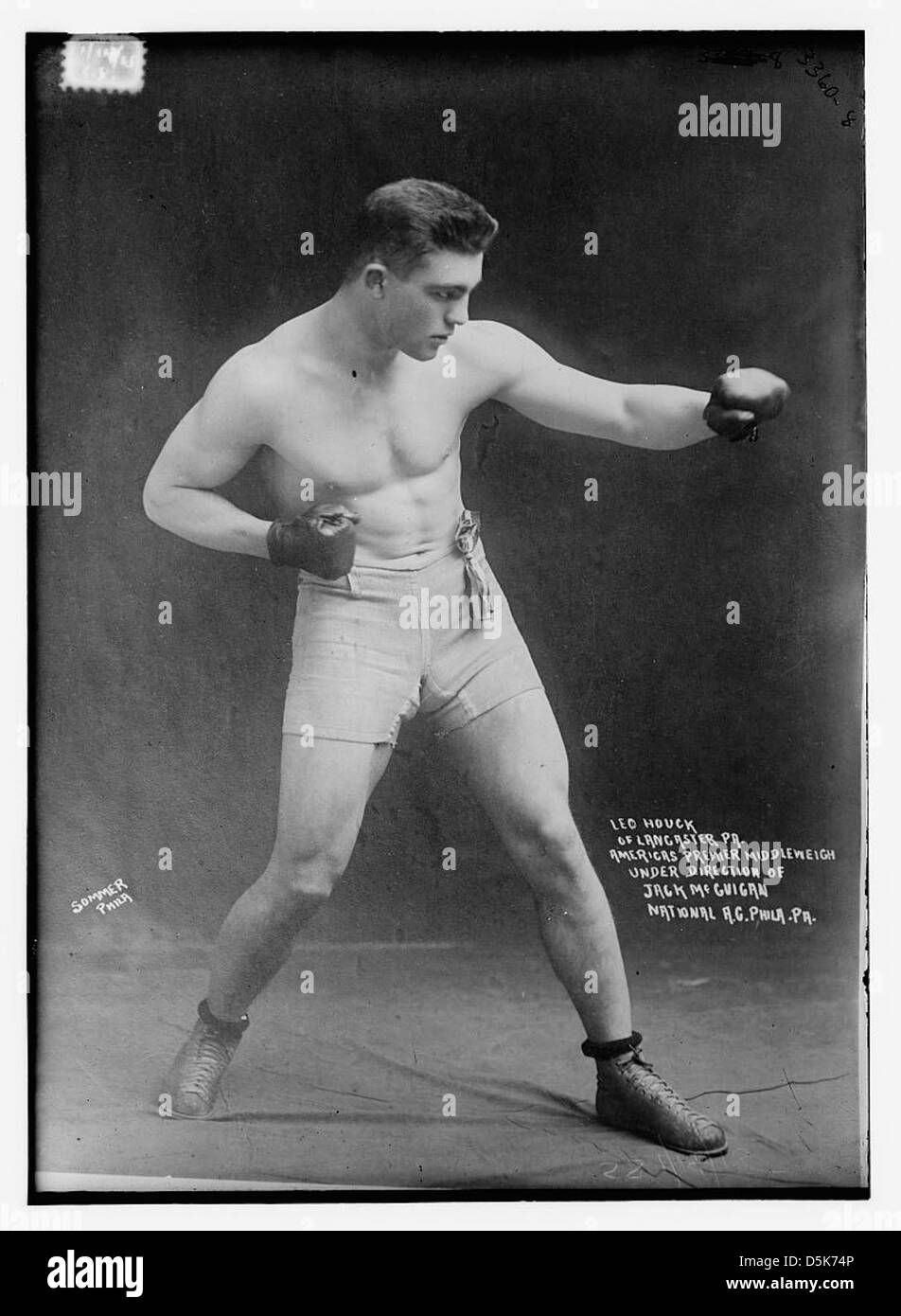 This image captures Leo Houck, a prominent middleweight boxer from ...