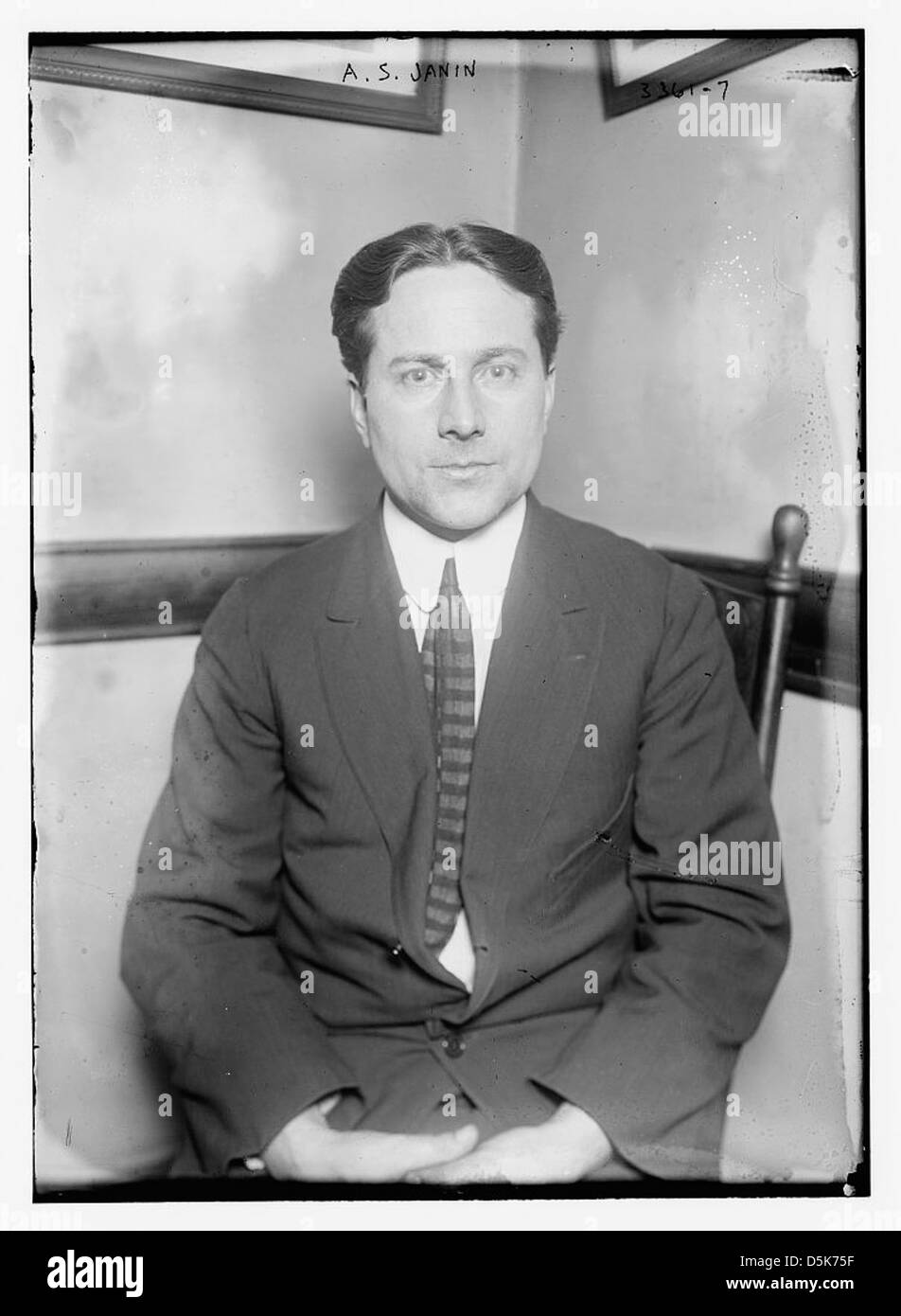 A photograph of A.S. Janin, captured in a formal portrait. This image ...