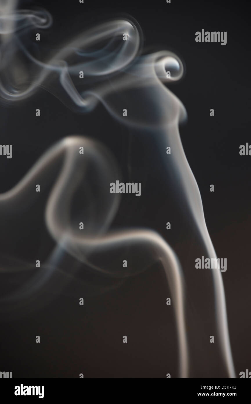 Smoke curling hi-res stock photography and images - Alamy