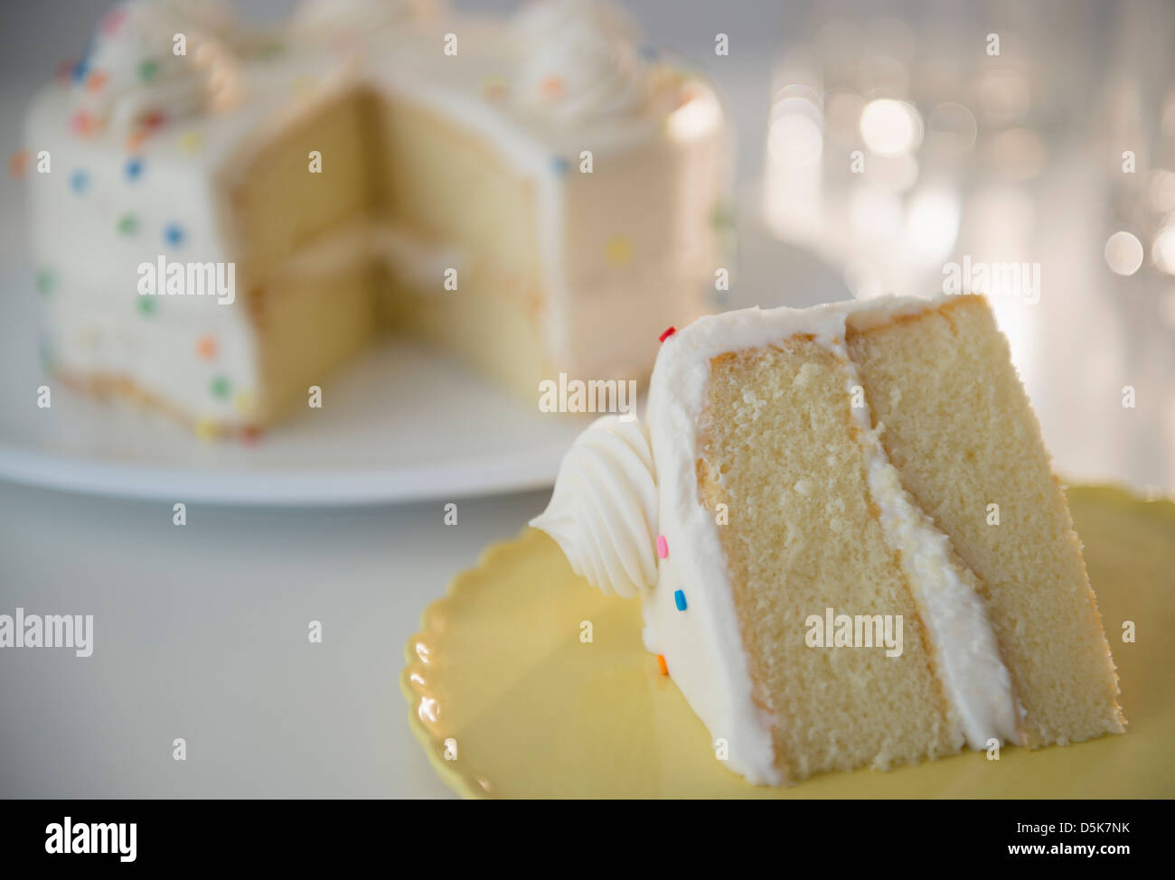 Studio shot of birthday cake slices Stock Photo - Alamy