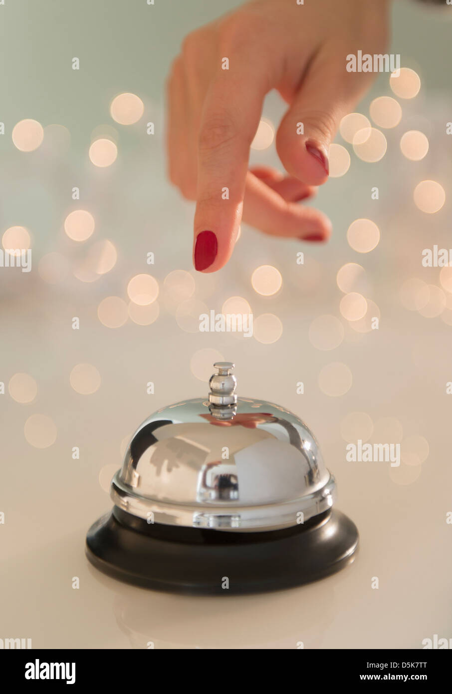 Hand and service bell Stock Photo - Alamy