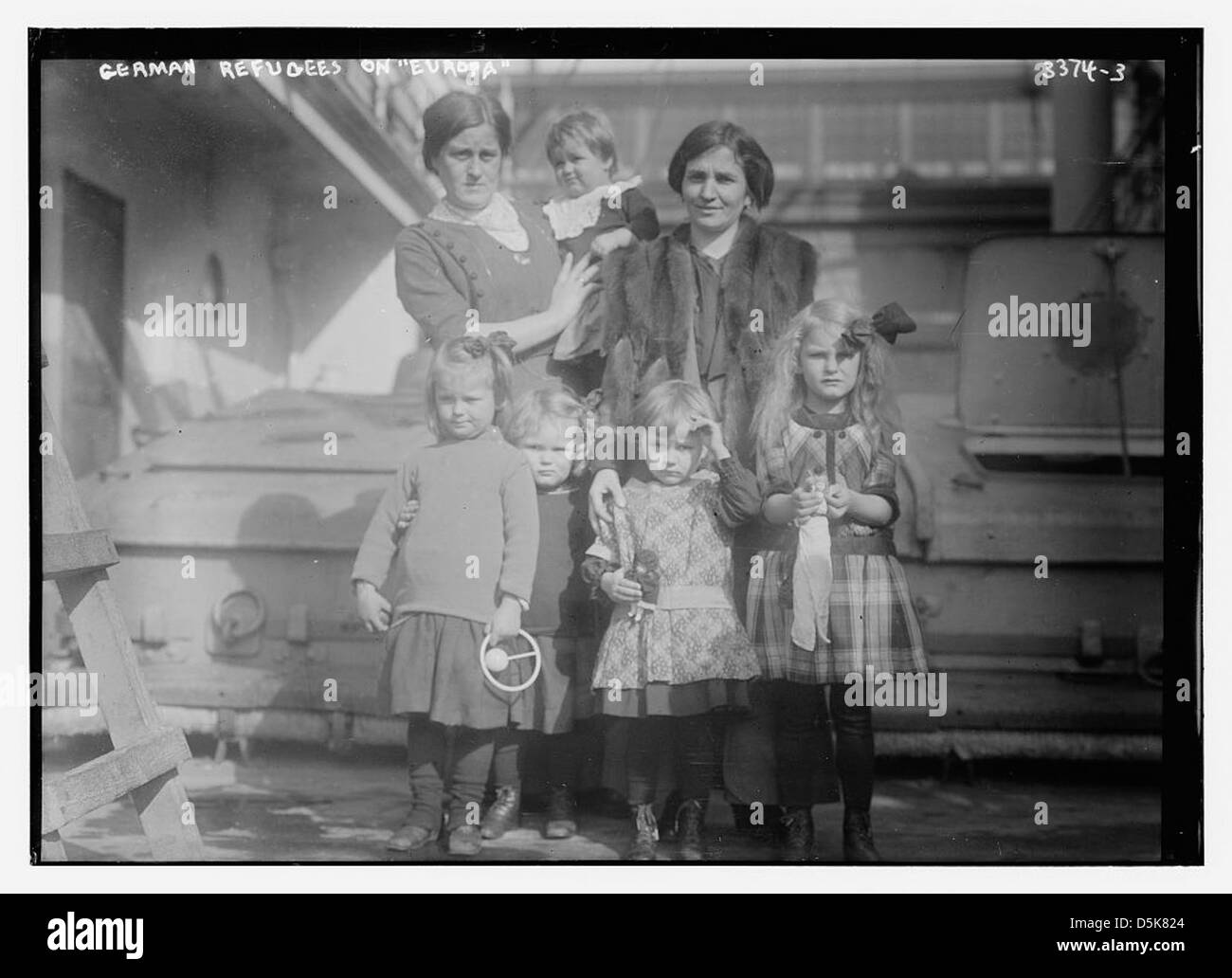 This photograph captures German refugees aboard the ship Europa ...
