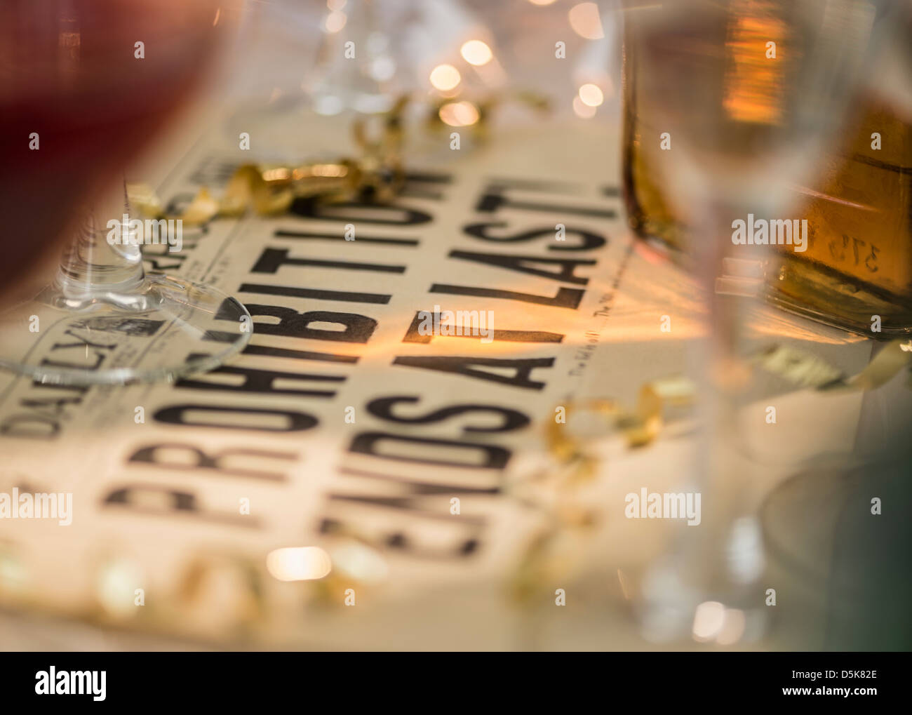 Vintage newspaper on table with alcohol Stock Photo - Alamy