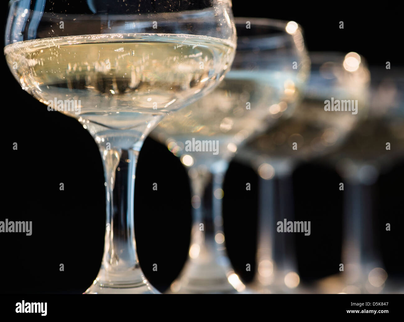 Studio shot of champagne in champagne coupes Stock Photo - Alamy