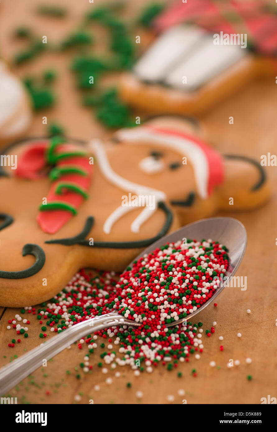 Teddy bear gingerbread and spoon on sprinkles Stock Photo - Alamy