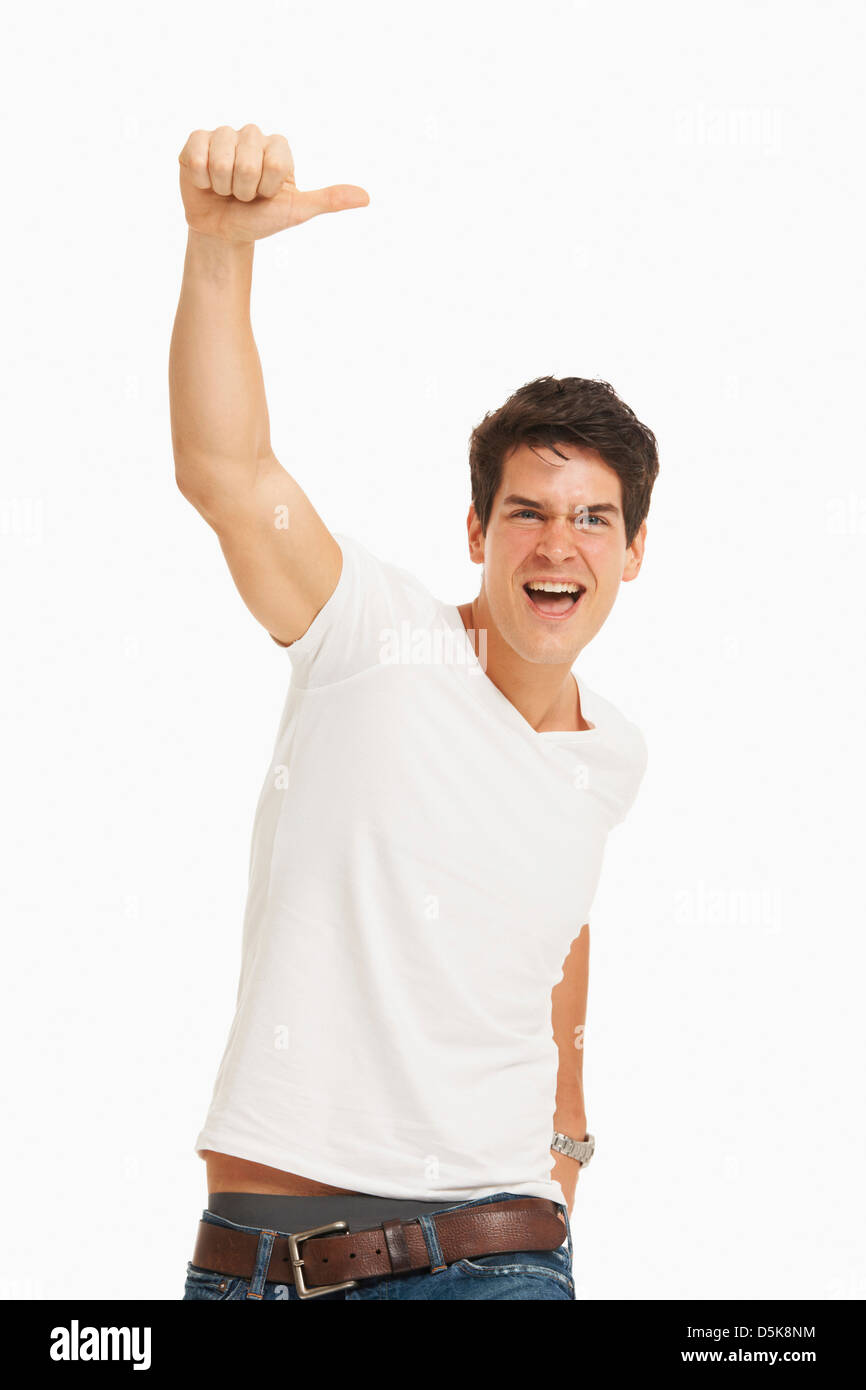 Happy handsome man cheering arms hi-res stock photography and images ...