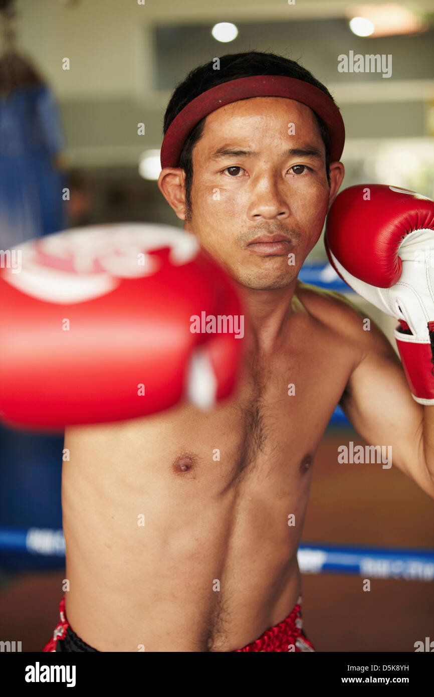 Portrait of mid adult male boxer in fighting stance Stock Photo - Alamy